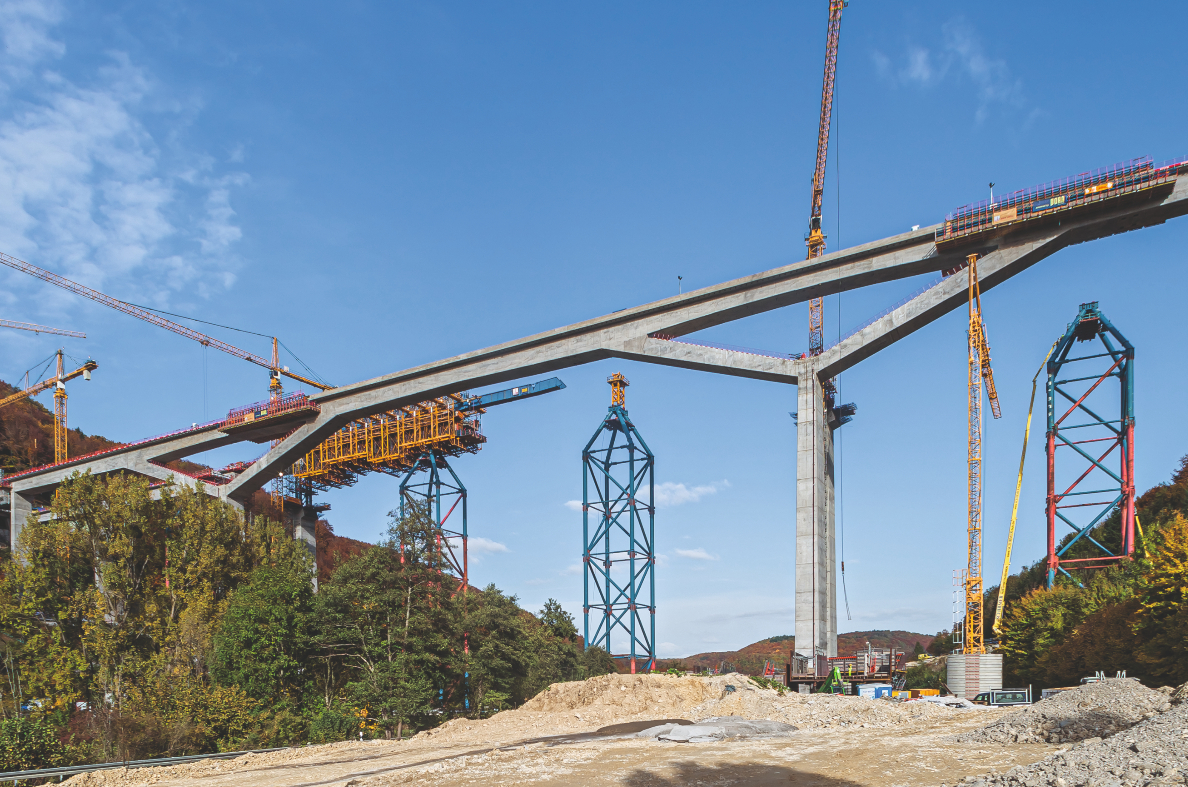 The cantilevered parapets on the west bridge were constructed in 24-m ...