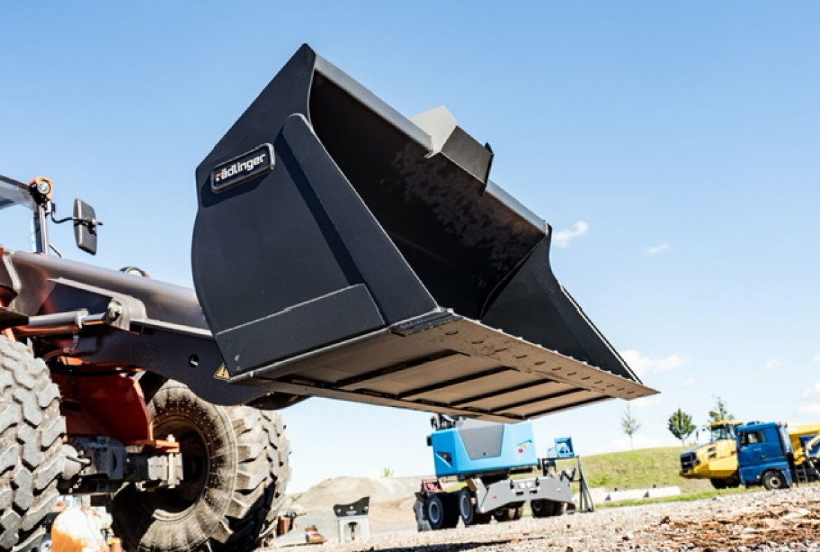 The revised standard loading shovel is available with a screw-on ...