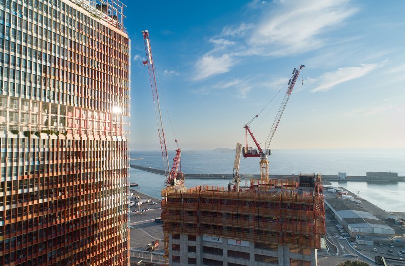 Potain MR 295 luffing jib cranes climb to new heights on high rise ...